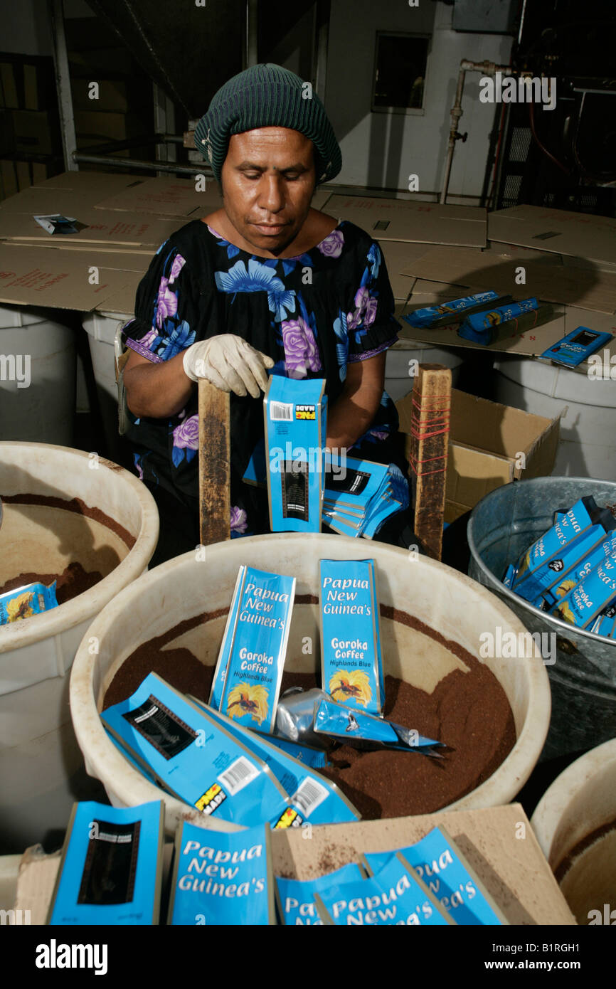 Women are packaging highlands coffee, roastery, Goroka, Papua New ...