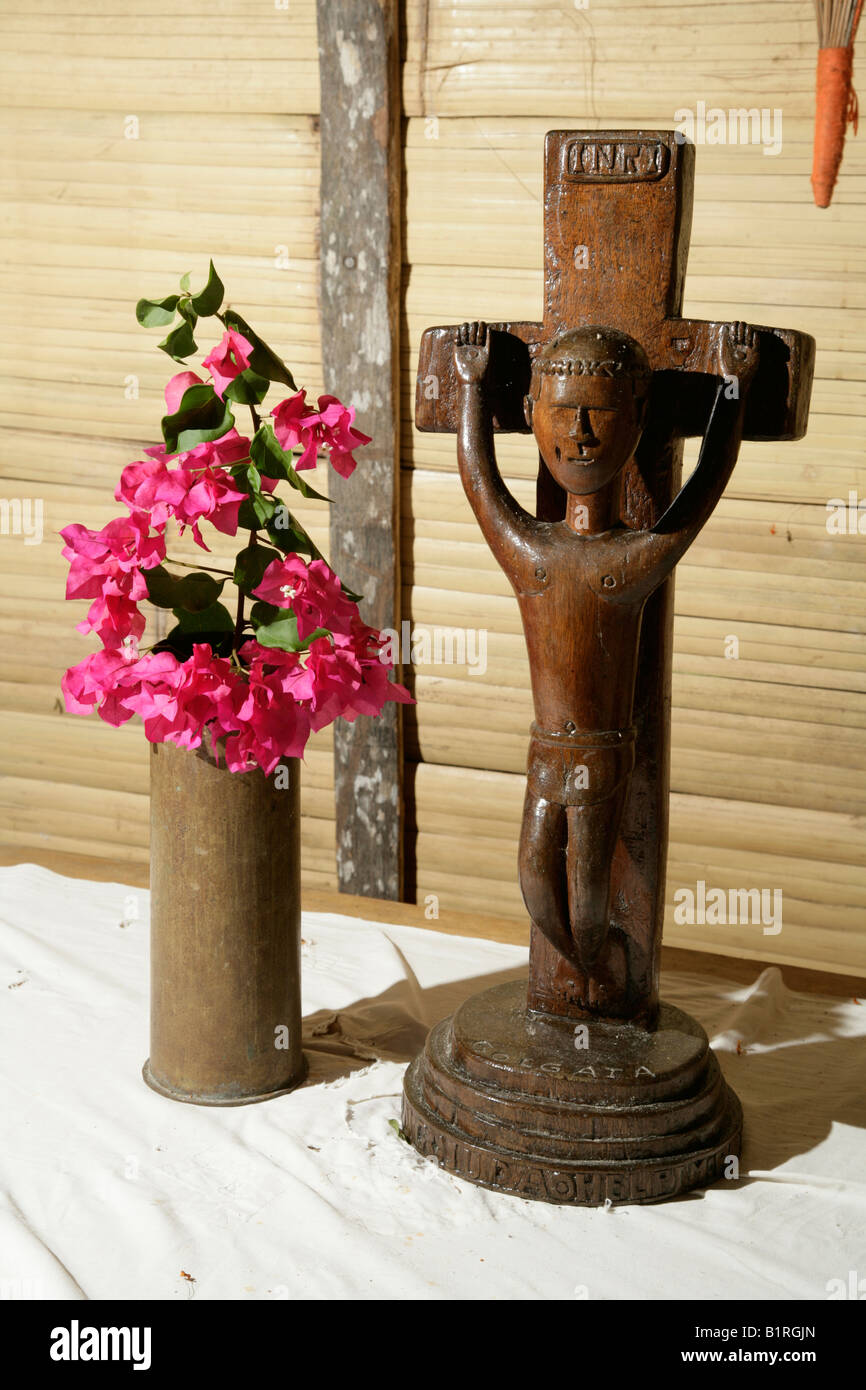 Crucifix, traditionally carved wooden figure of Christ on an altar ...