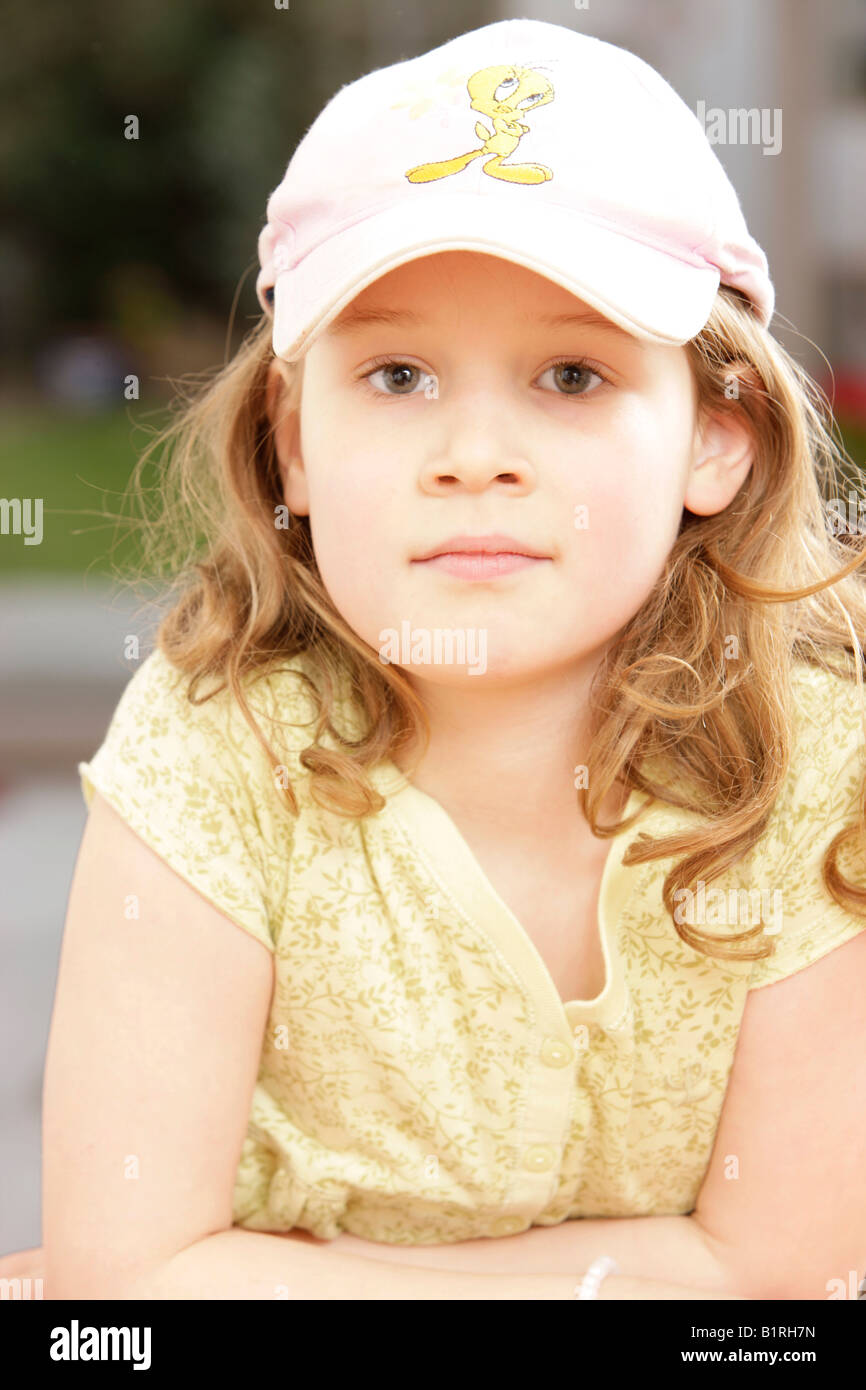 Girl, 8 years old, wearing a cap Stock Photo - Alamy