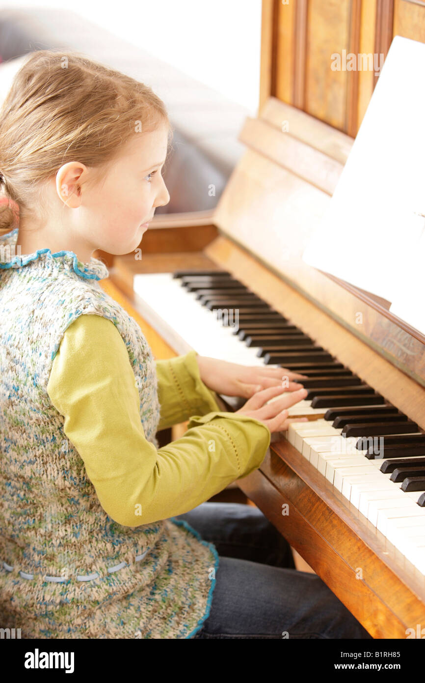 Girl 8 Years Old Playing Piano Stock Photo Alamy girl-8-years-old-playing-piano-stock-photo-alamy