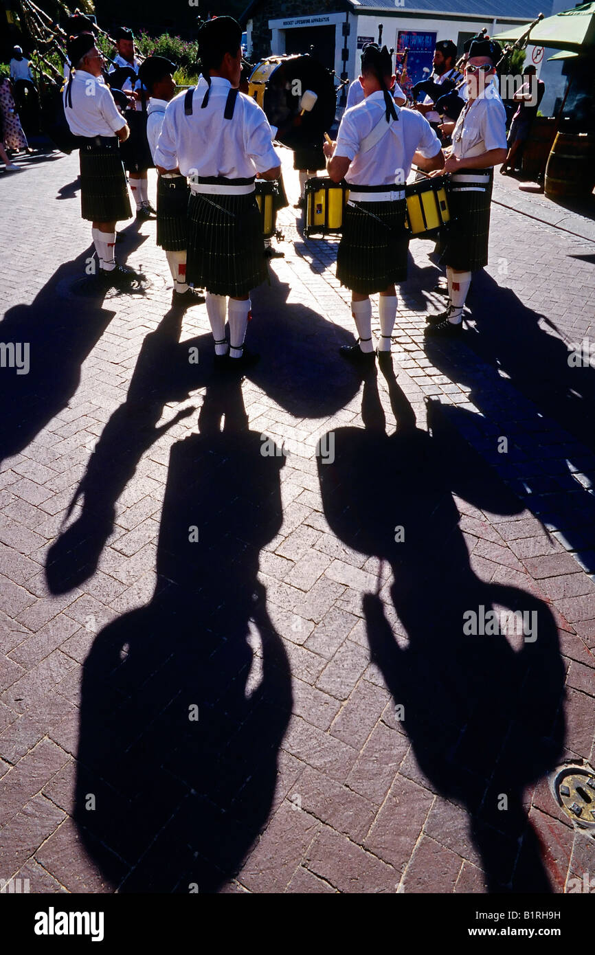 Highlander band performing in front of a brewery, V & A Waterfront ...