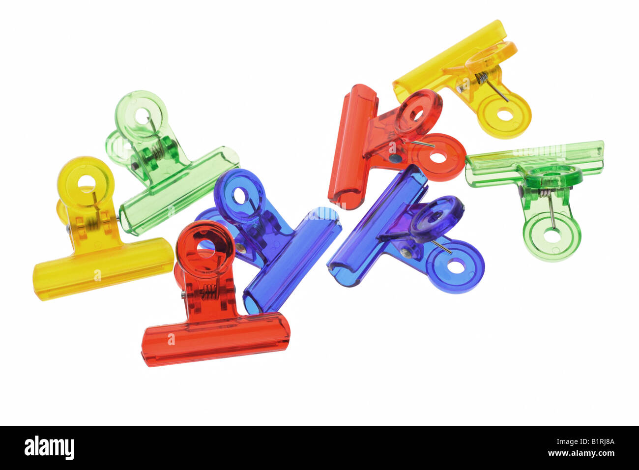 Colored plastic paper clips arranged on white background Stock Photo ...