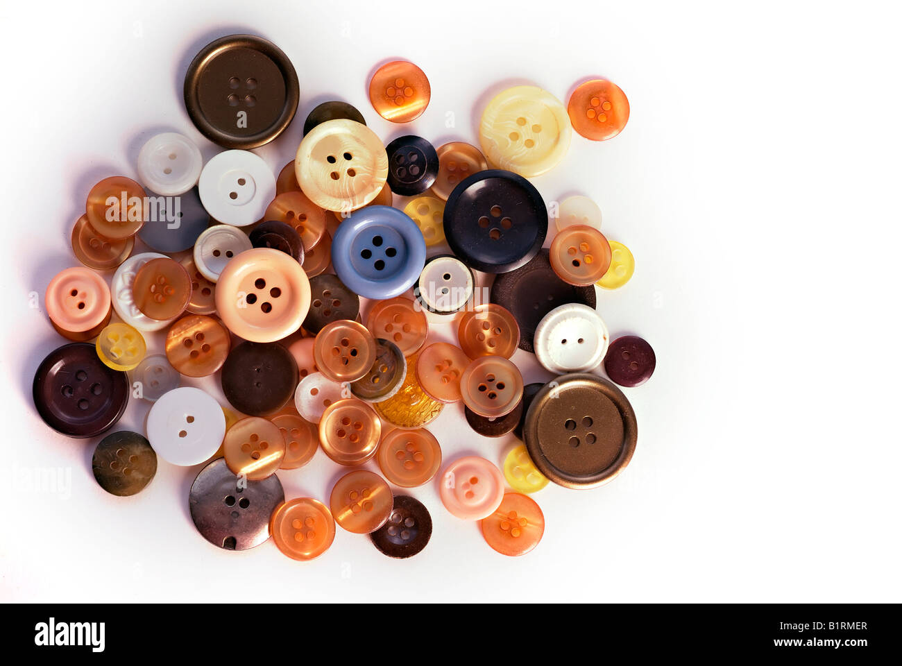 multi color and shape buttons on white Stock Photo - Alamy