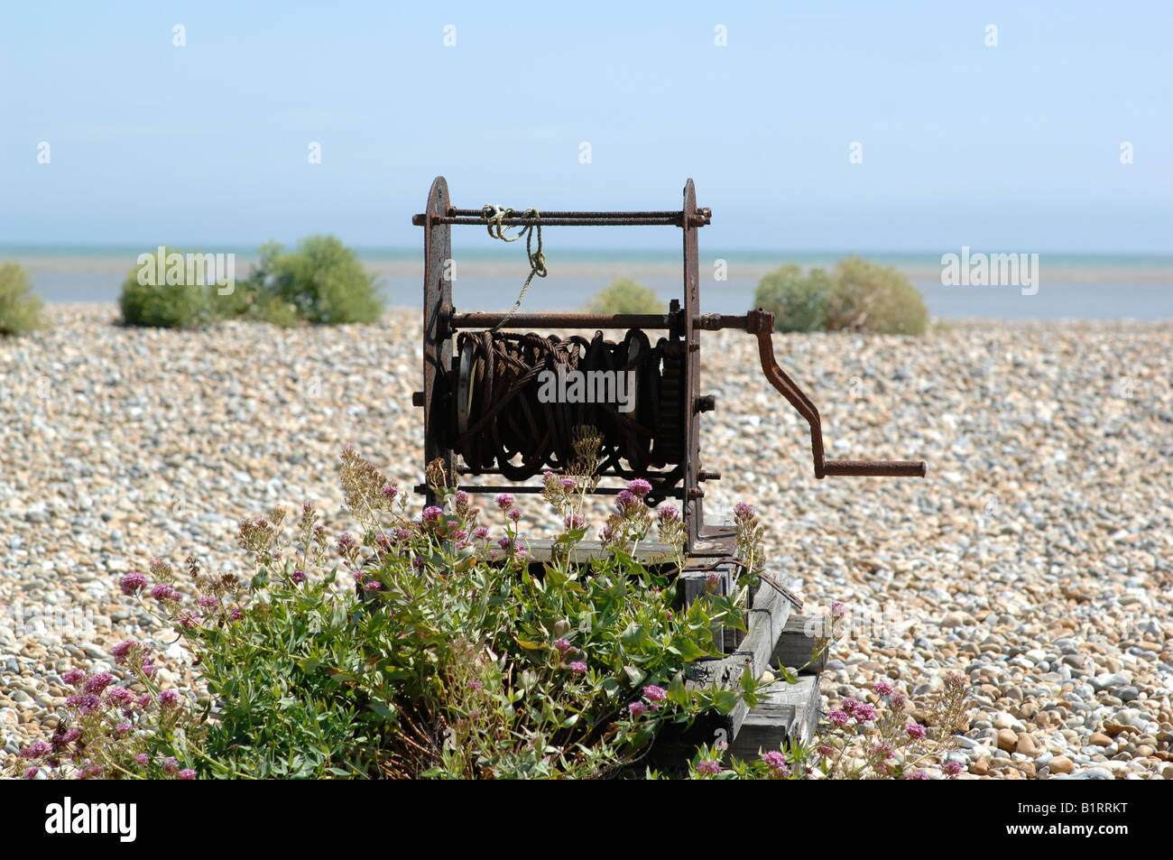 Old boat winch on Littlestone beach, Kent, England Stock Photo - Alamy