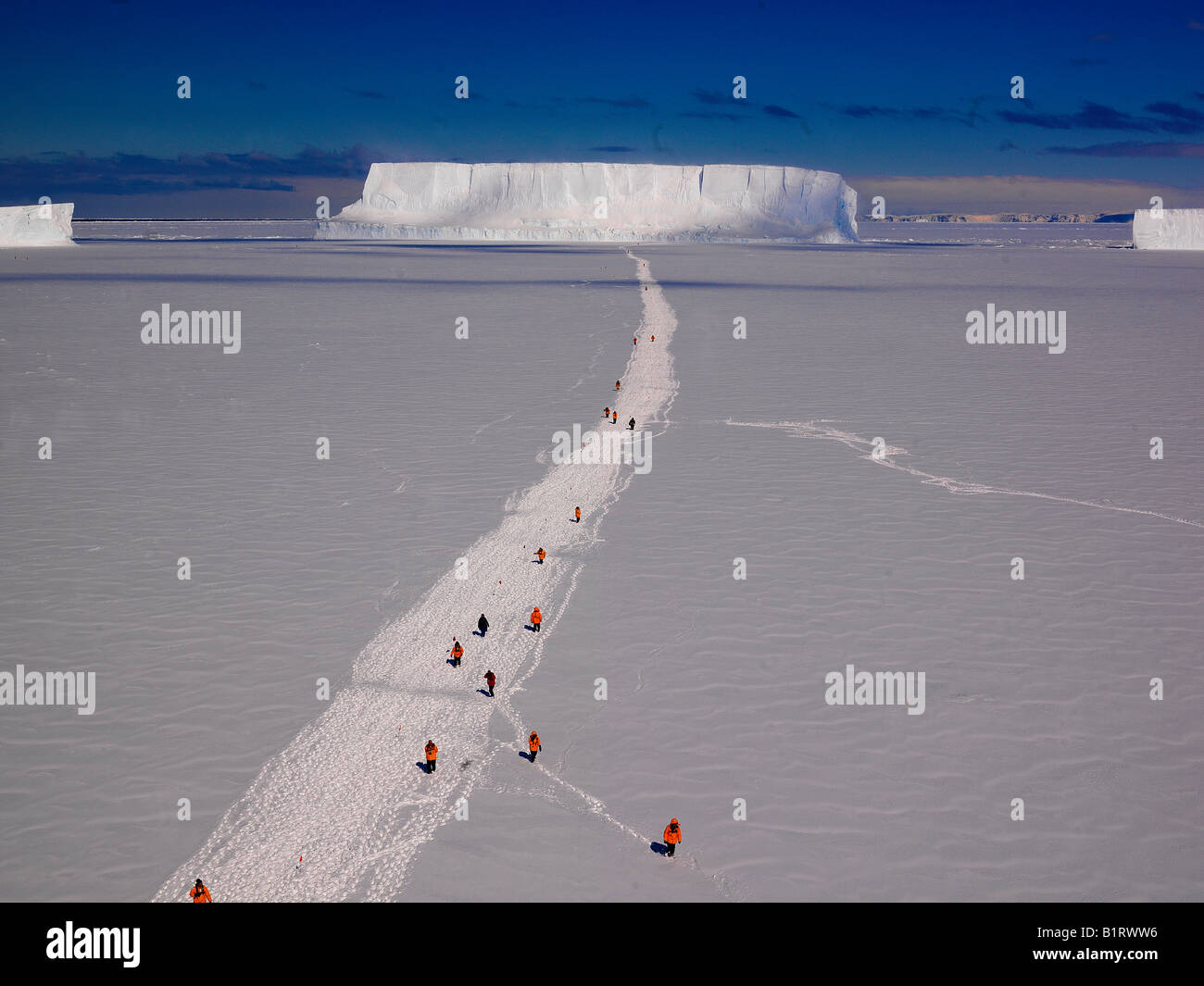 Hike over sea ice to a big iceberg in front of Cape Washington, Ross ...