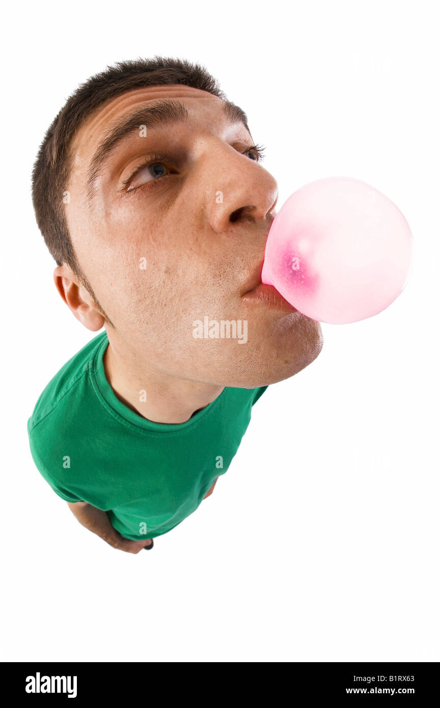 Man blowing bubble gum hi-res stock photography and images - Alamy