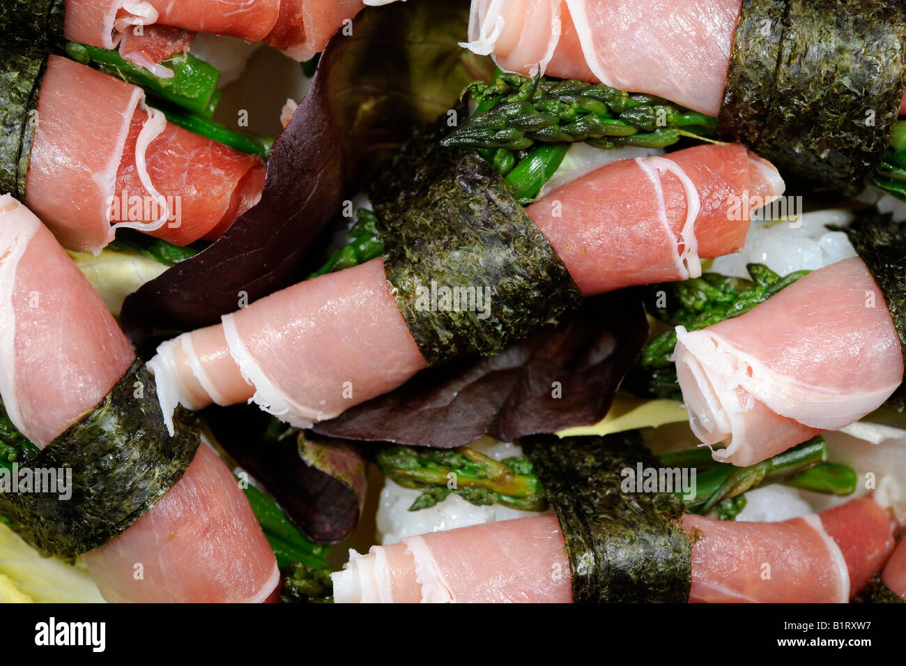 Nigiri Sushi with raw ham Stock Photo - Alamy