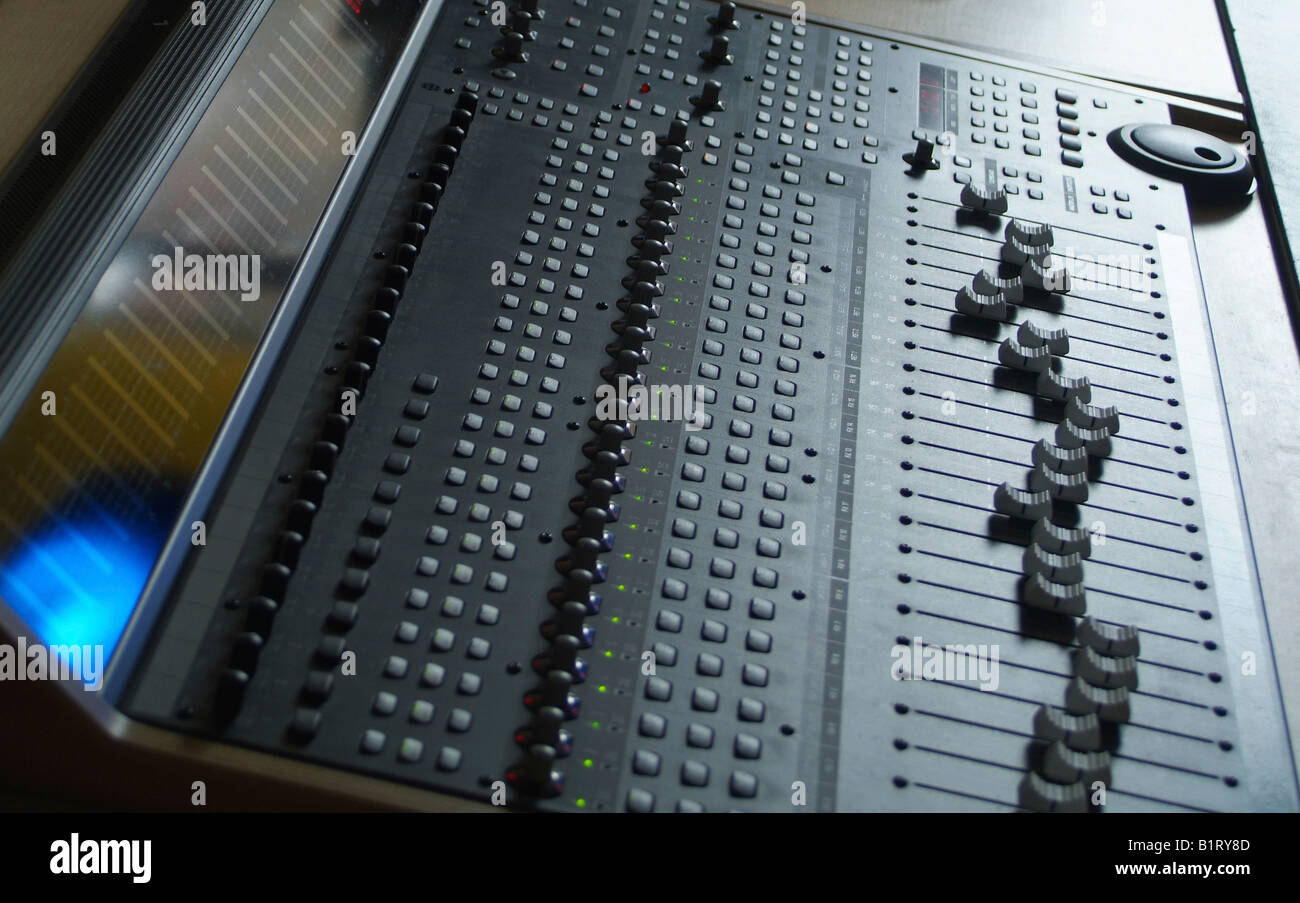 Sliding controls, turning controls and buttons of a professional mixer ...
