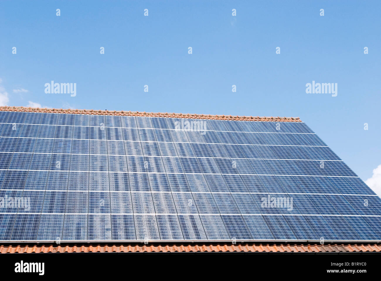 Solar cells installed on a roof Stock Photo - Alamy