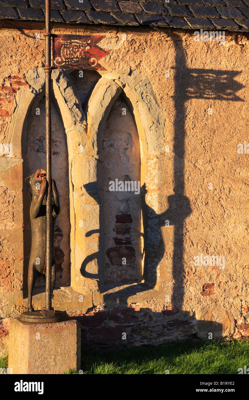 Unusual statue of a cat with a staff in Petty Parish Cemetary ...