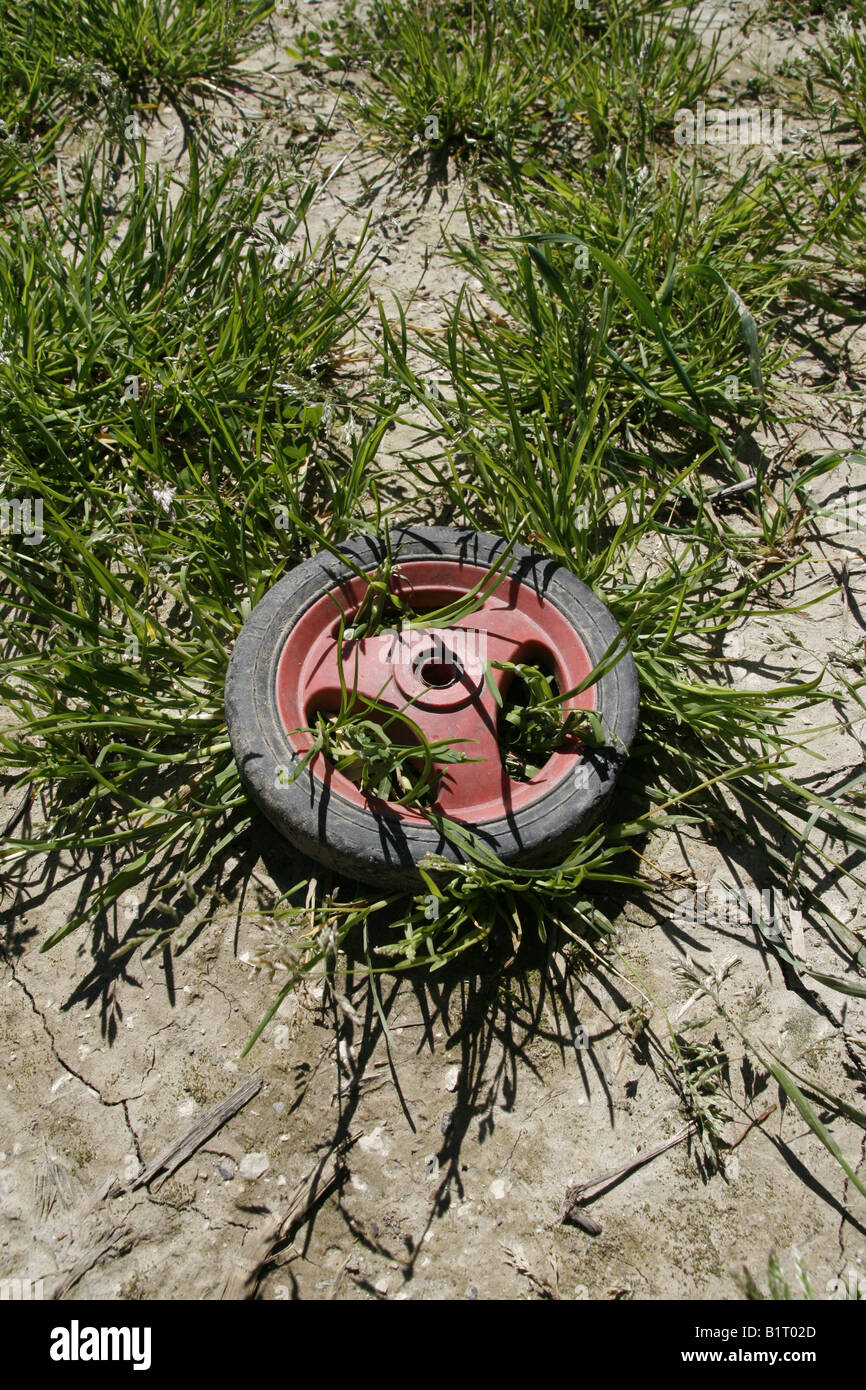 one small tyre wheel lost in countryside Stock Photo - Alamy