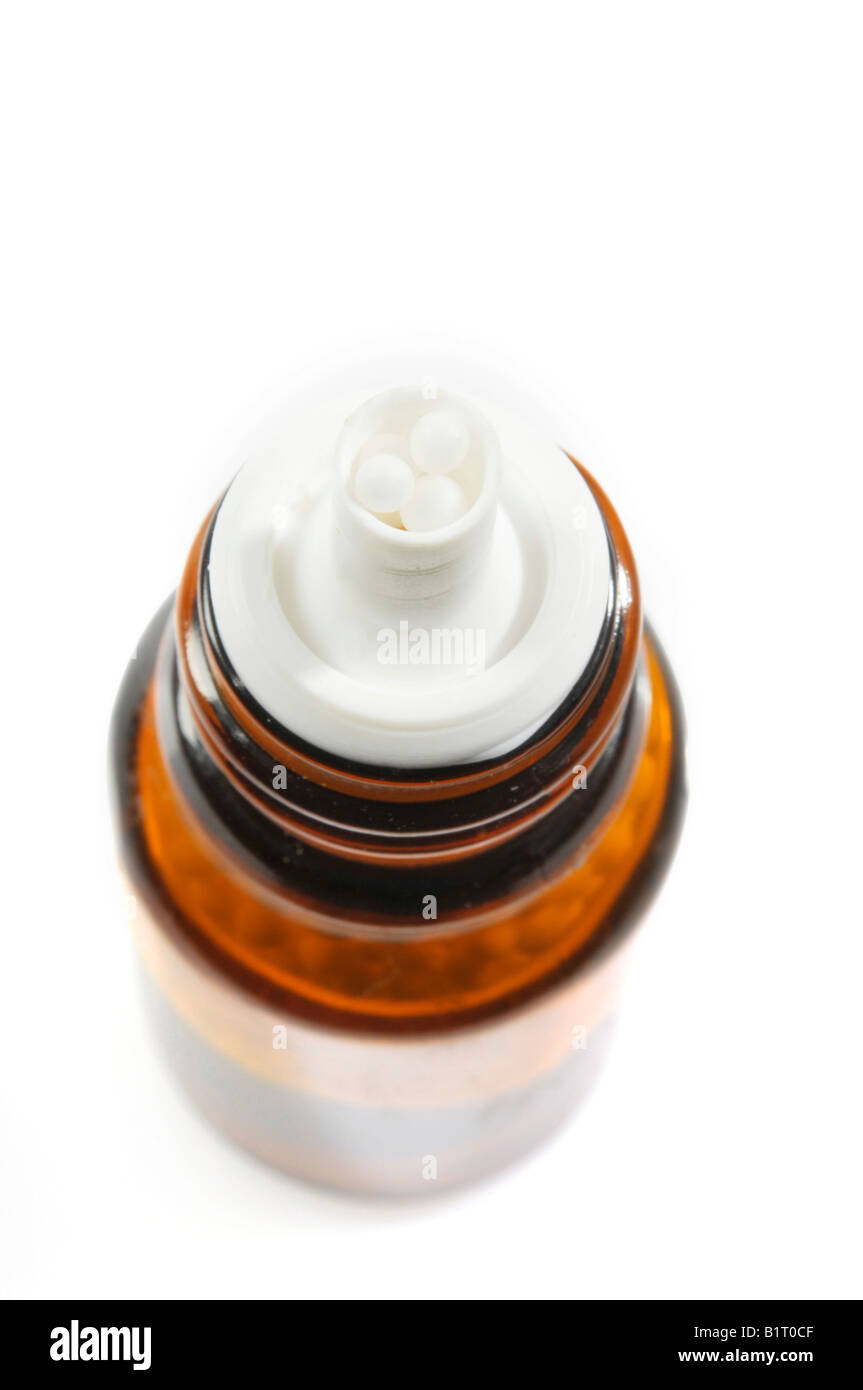 Bottle of homeopathic medicine in globule or ball form Stock Photo - Alamy