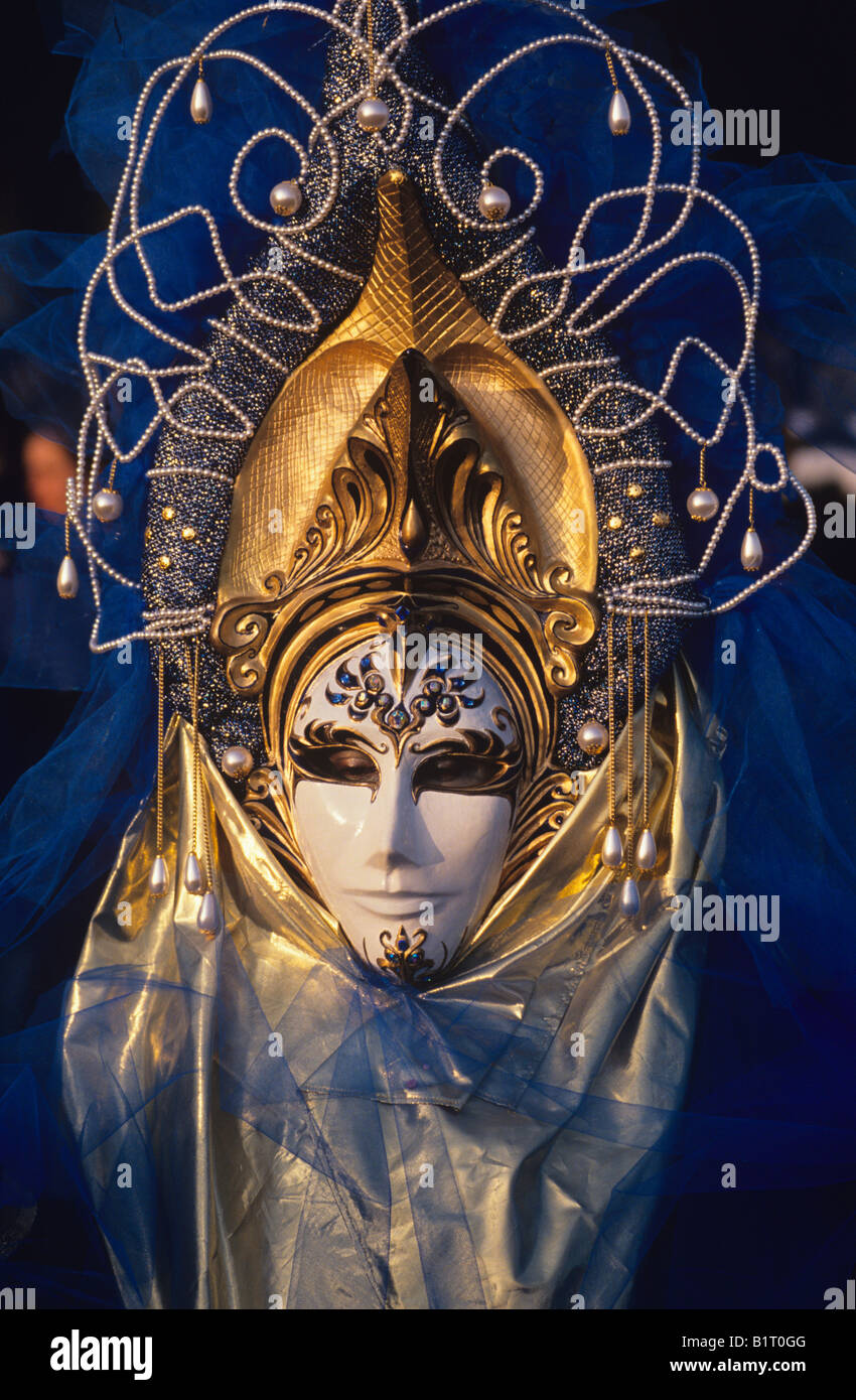 Head and shoulder view of carnival figure in blue and gold Stock Photo ...