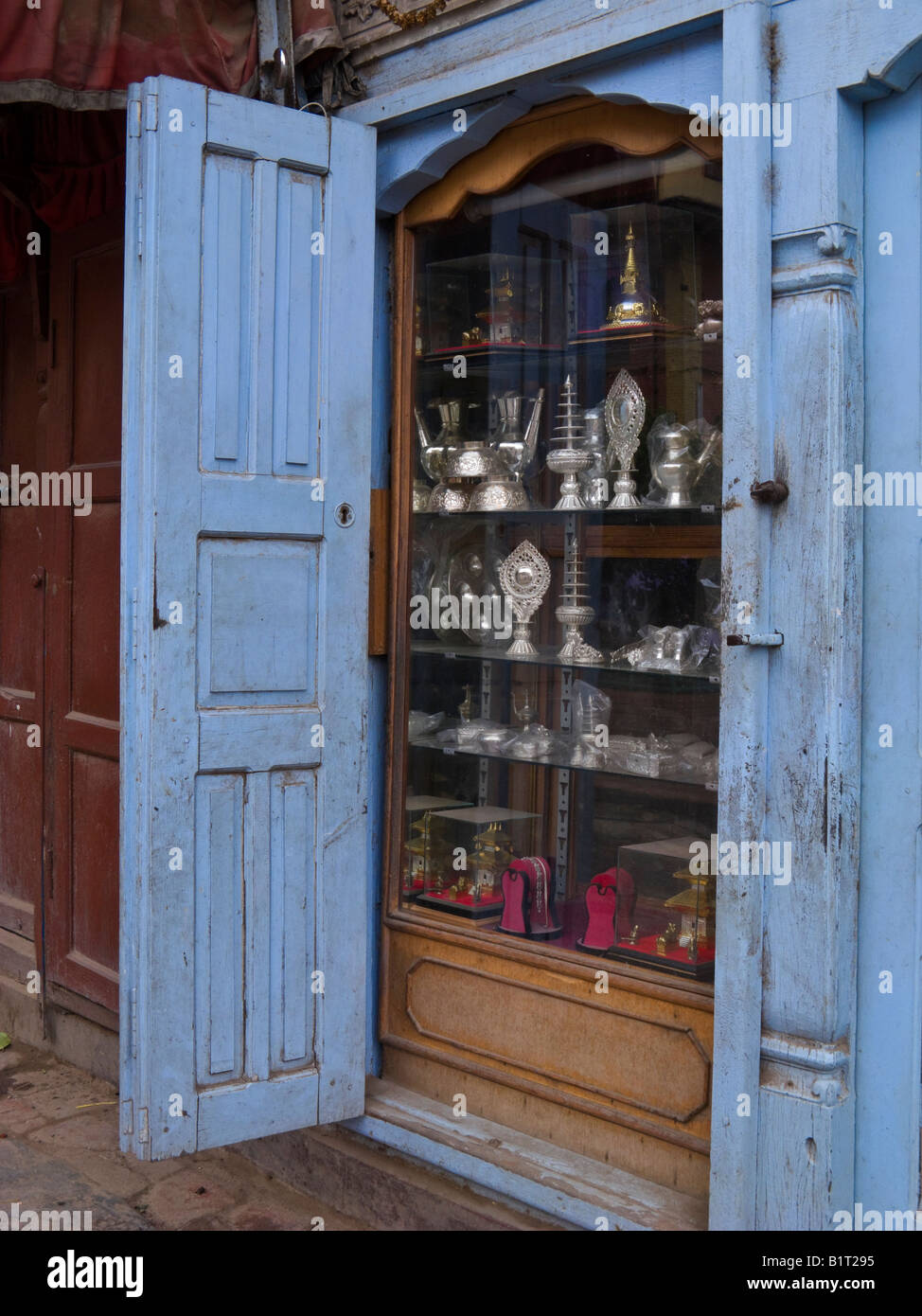 Small shop with blue shutters selling silver in Patan Nepal Stock Photo ...