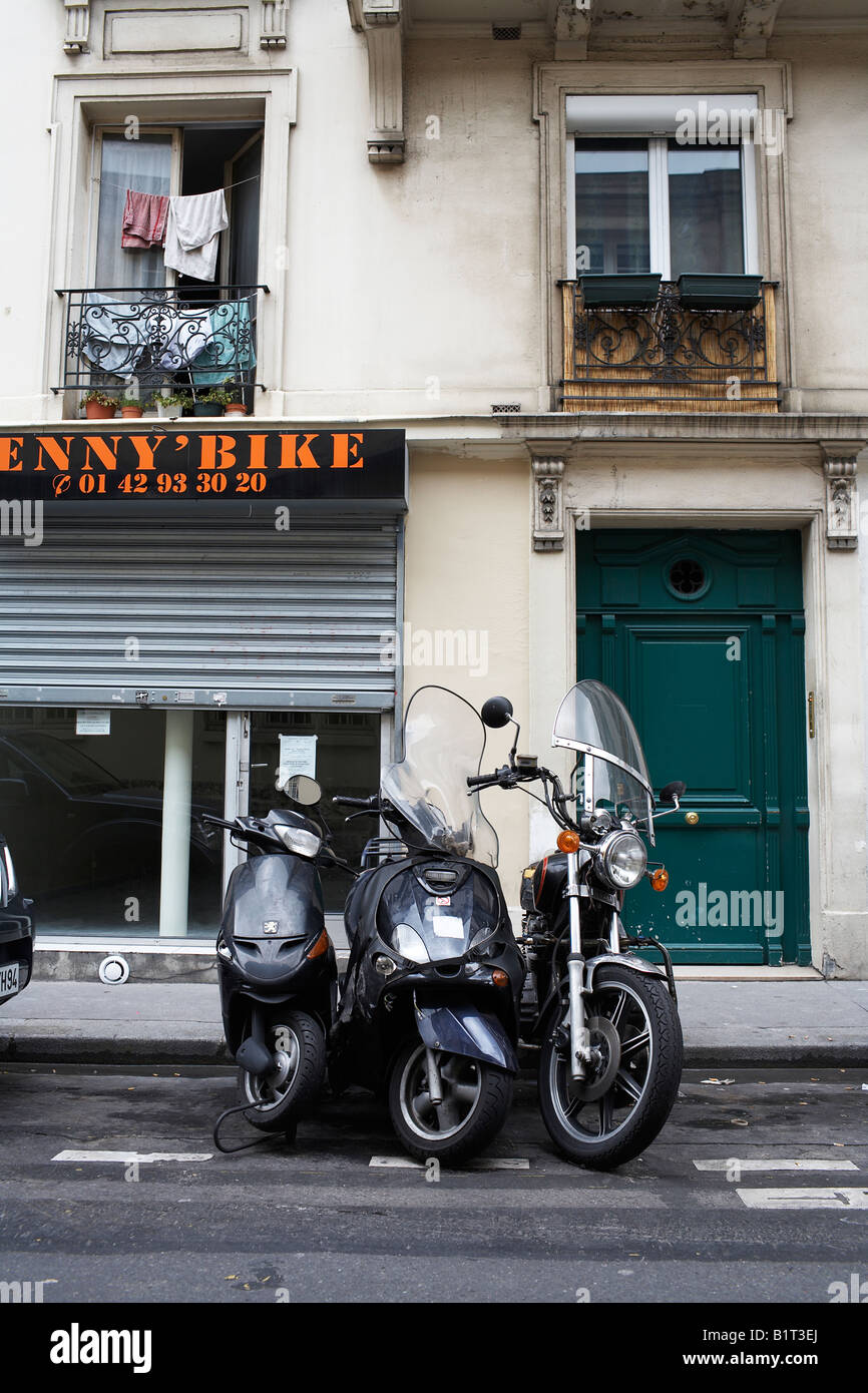 Street scene with motorbikes in Paris Stock Photo - Alamy
