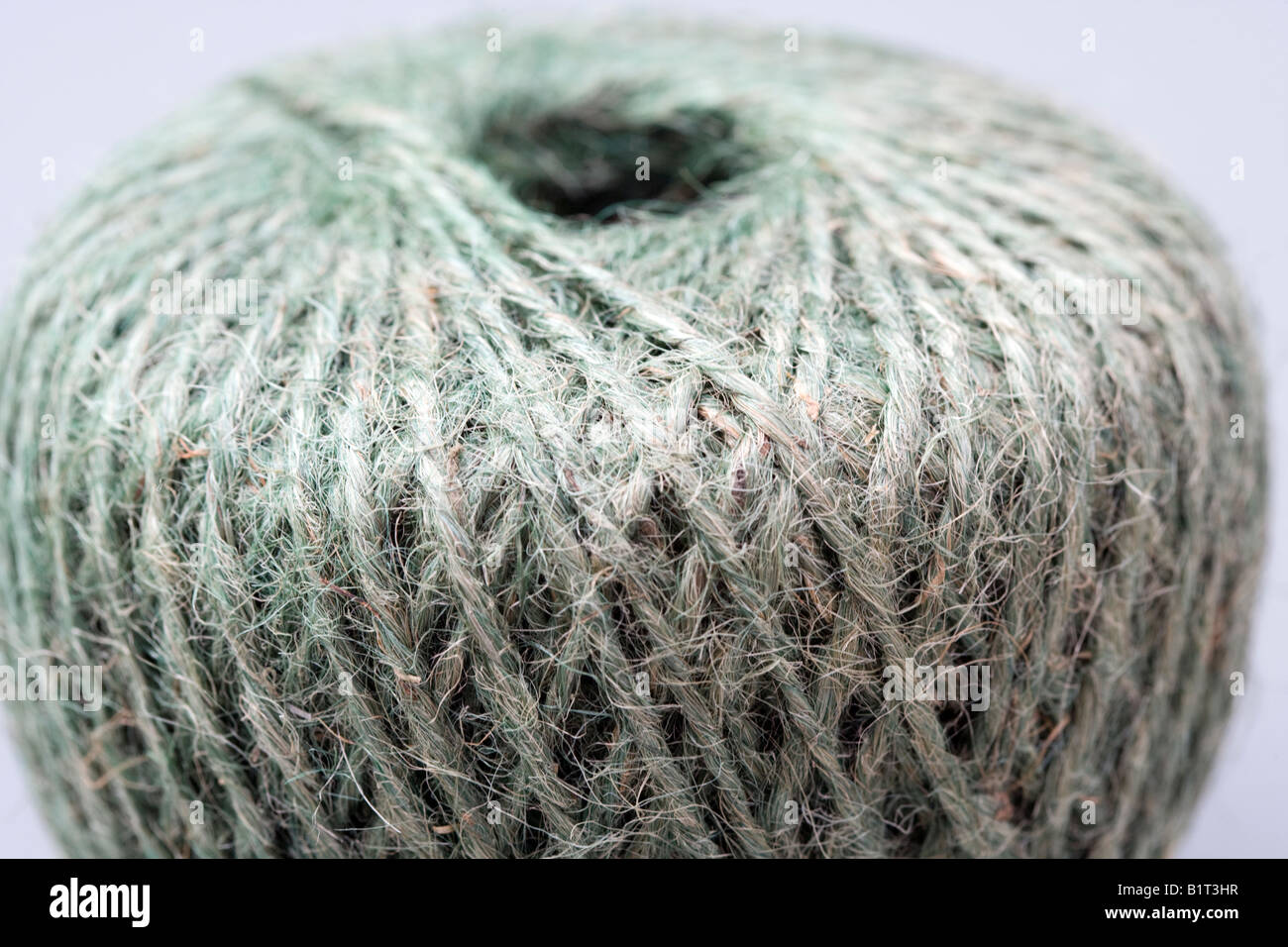 Green ball of string mainly used for gardening Stock Photo - Alamy