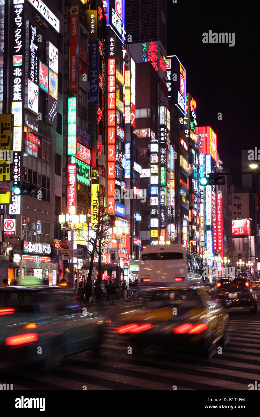 Neon light & traffic of Shinjuku district in Tokyo Japan Stock Photo ...