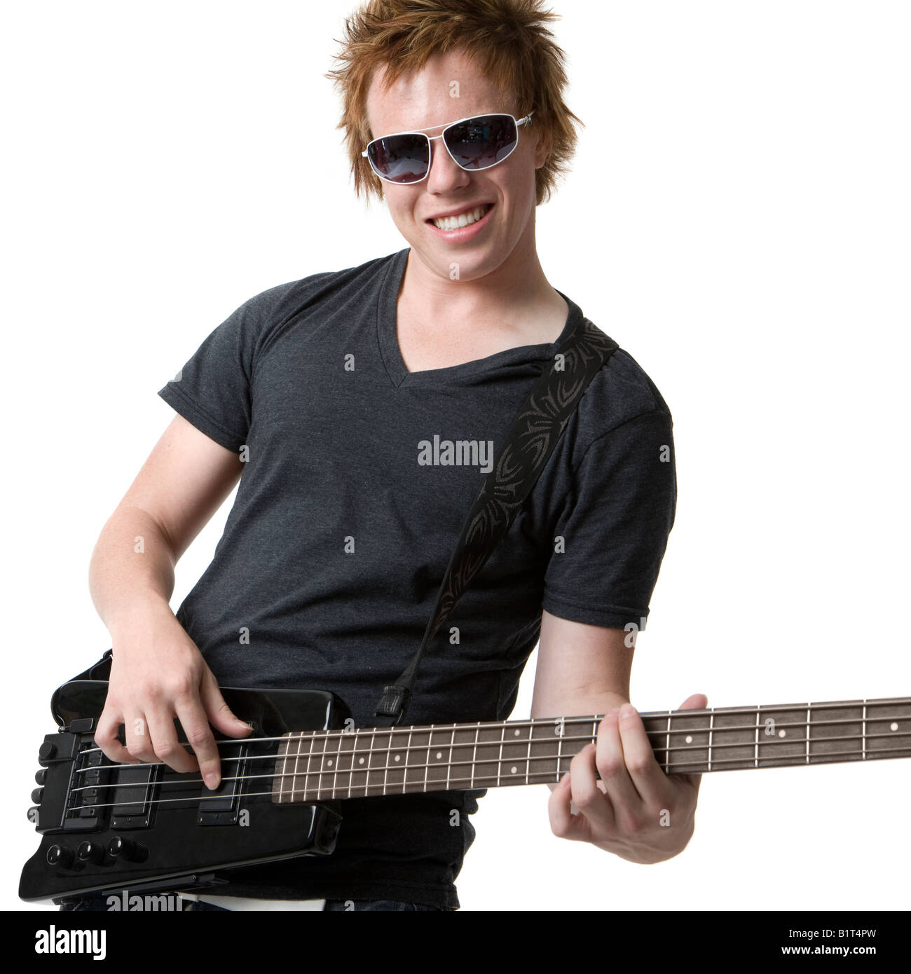 A Rocking dude with an electric bass guitar Stock Photo - Alamy