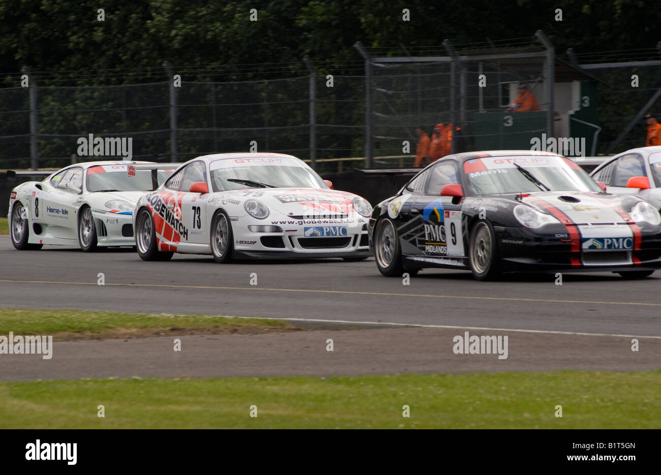 Porsche 996 and 997 with Ferrari 360 GT Exiting Old Hall Corner in GT ...