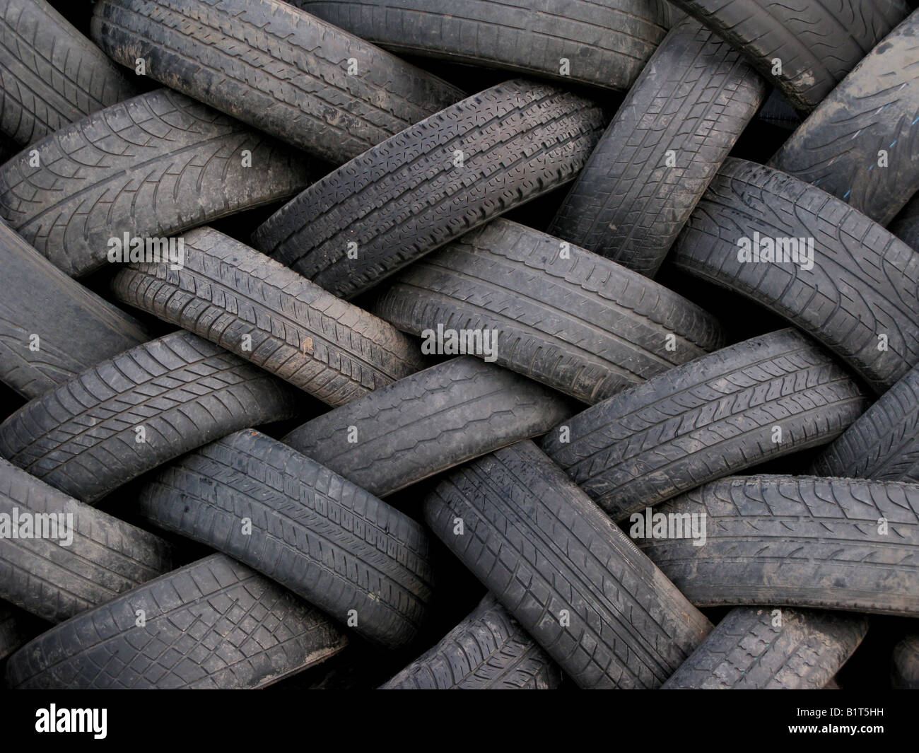 old tyres stacked up Stock Photo - Alamy