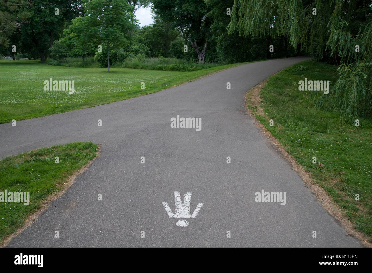A pedestrian symbol on a trail Stock Photo - Alamy