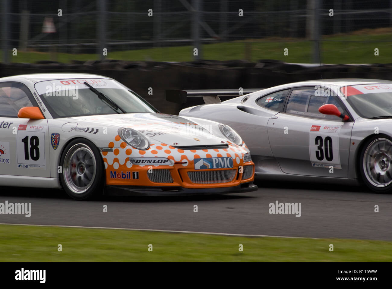 Ferrari 360 GT and Porsche 997 GT3 Sports Race Cars Exiting Old Hall ...