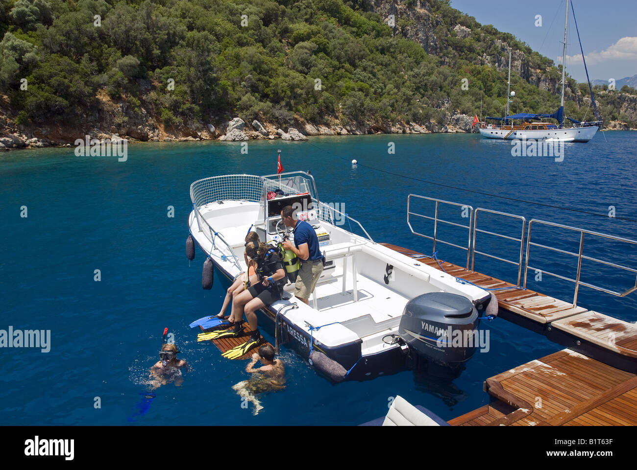 Scuba divers and swimmers in Gokova Bay Marmaris Turkey Stock Photo - Alamy