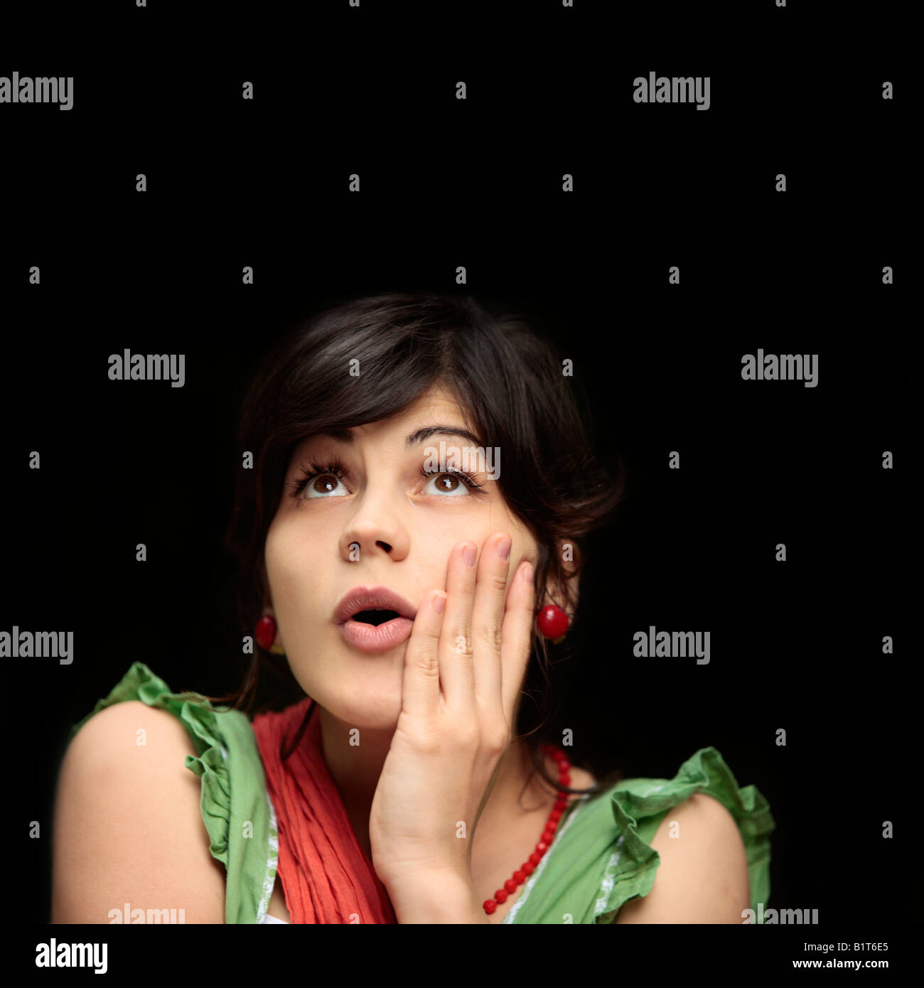 lovely excited woman looking up surprised and saying oh Stock Photo - Alamy