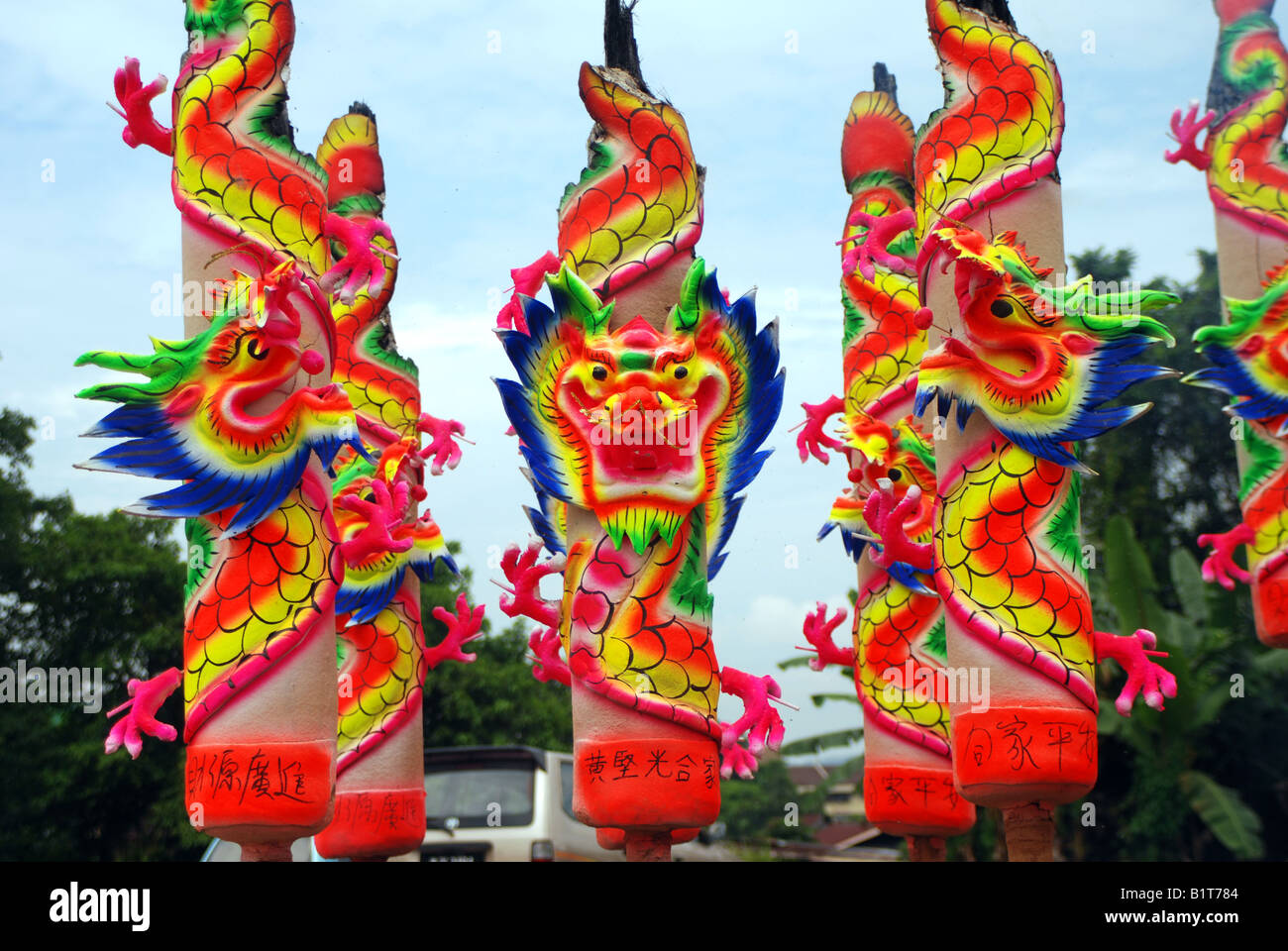 Giant incense sticks with dragon motif Stock Photo - Alamy