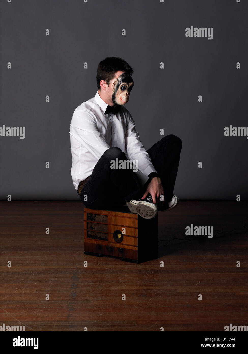 Monkey in suit hi-res stock photography and images - Alamy