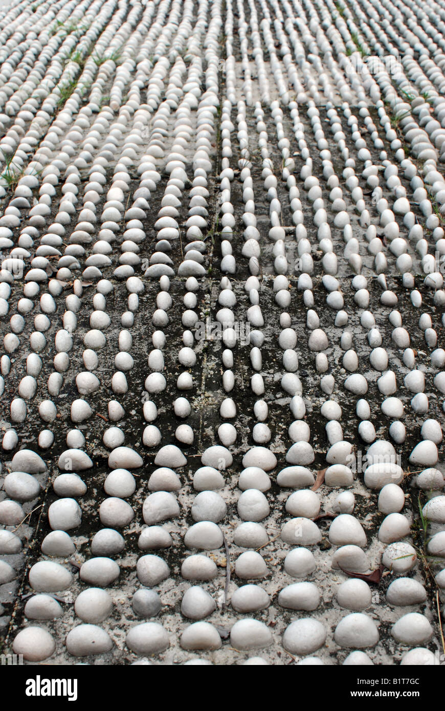 Foot reflexology pebble path Stock Photo - Alamy
