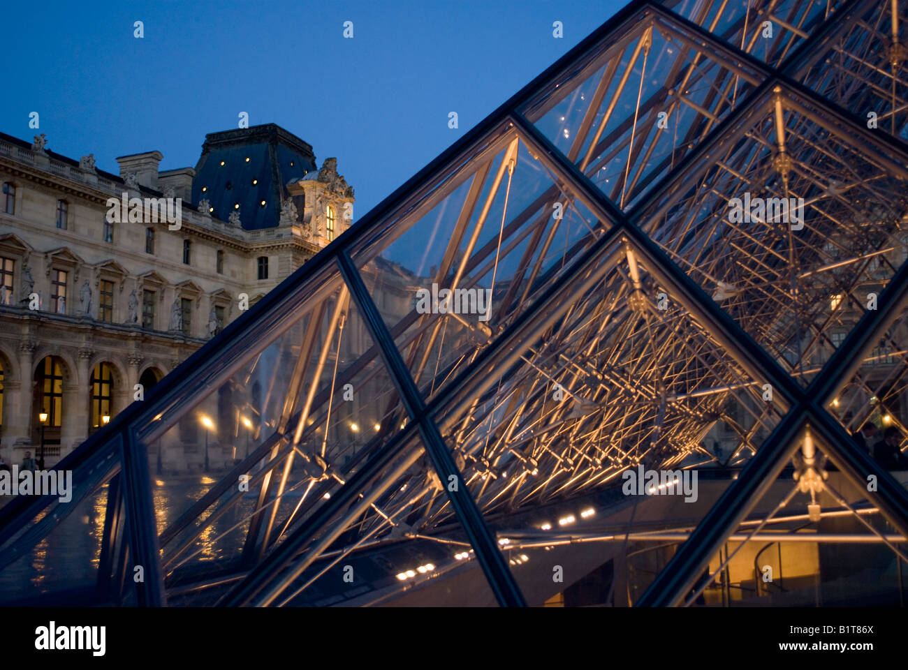 Louvre Museum as dusk in Paris France Stock Photo - Alamy