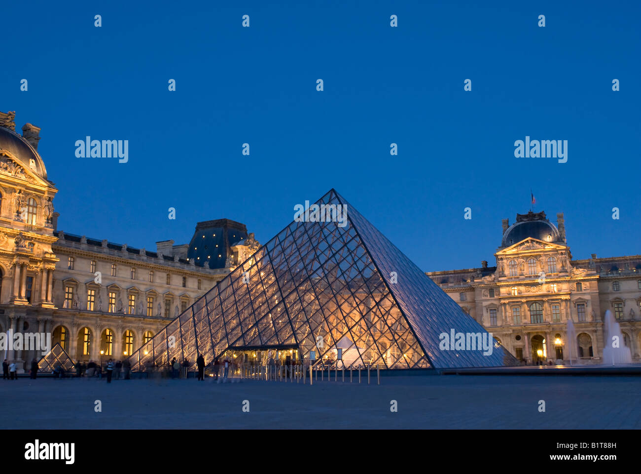 Louvre Museum as dusk in Paris France Stock Photo - Alamy
