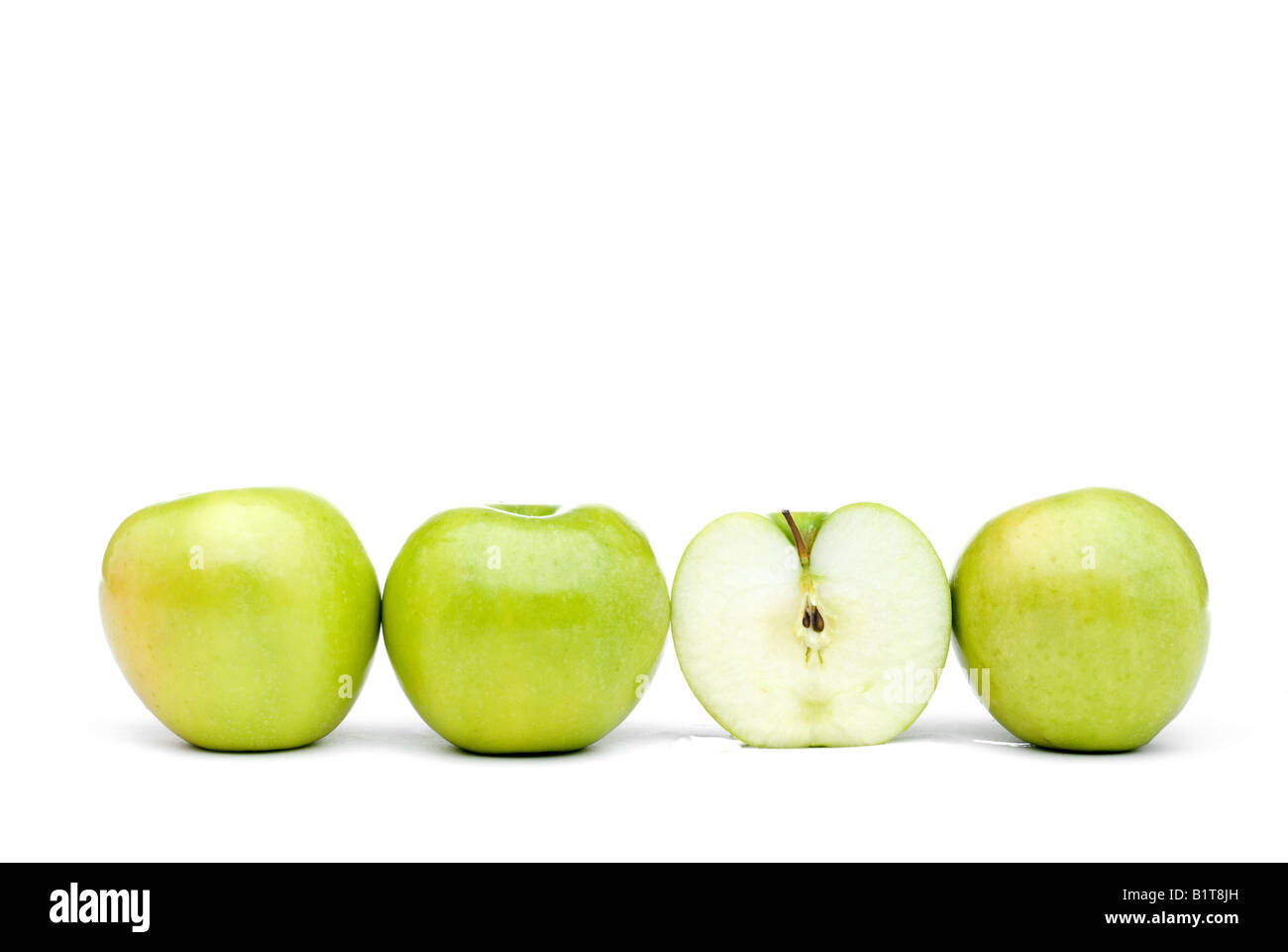 Halved green apple hi-res stock photography and images - Alamy