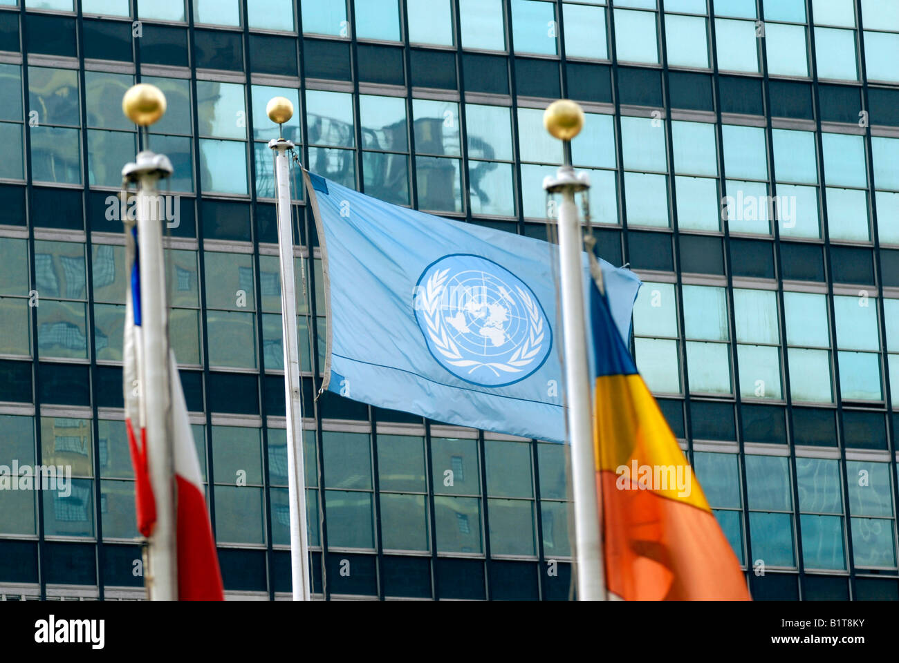 Flags flying outside the United Nations headquarters building in New ...