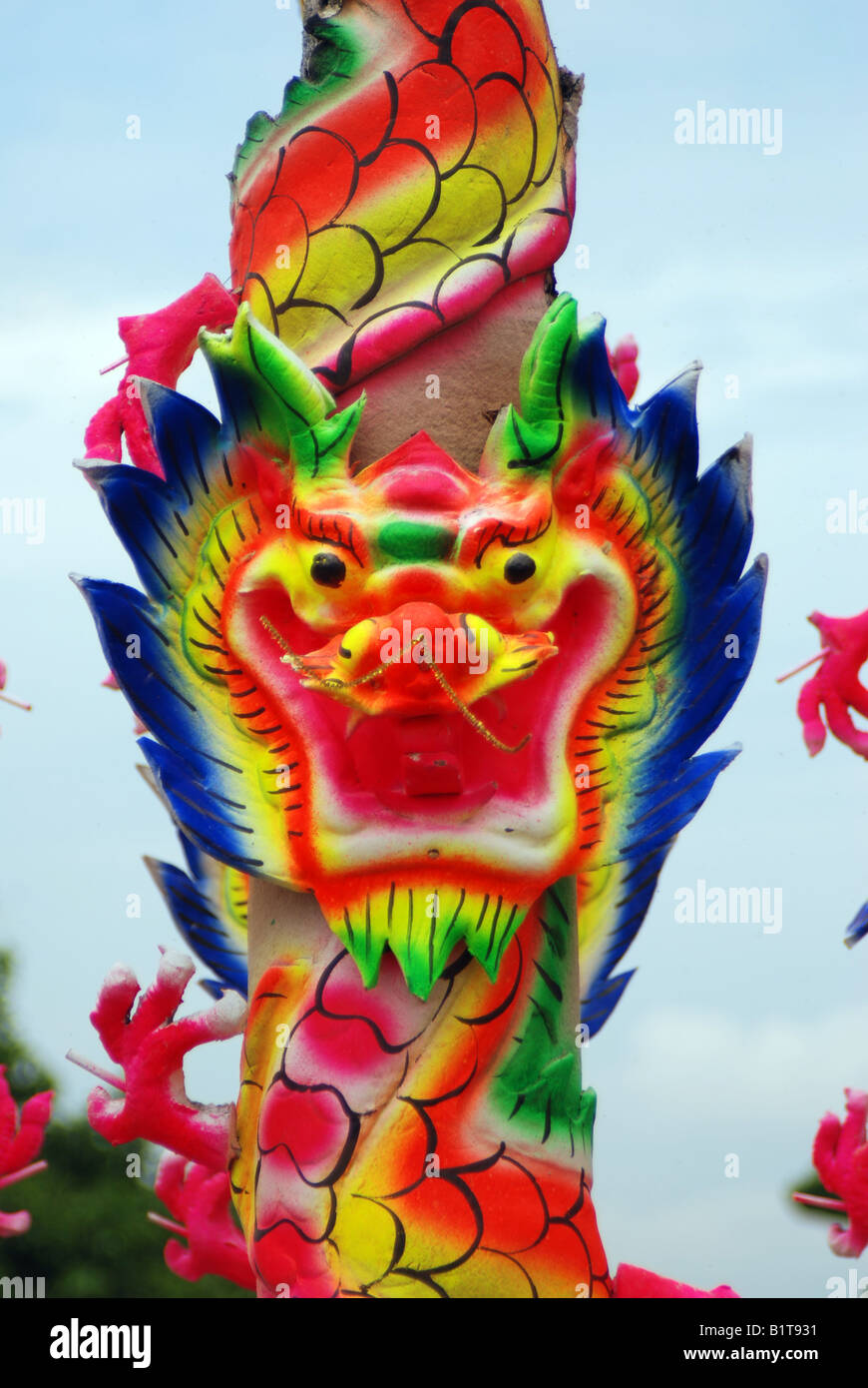Huge joss sticks with dragon motif Stock Photo - Alamy