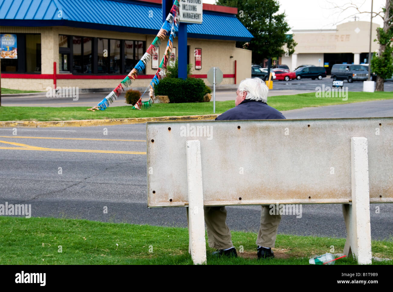 Bus stop sign bench hi-res stock photography and images - Alamy