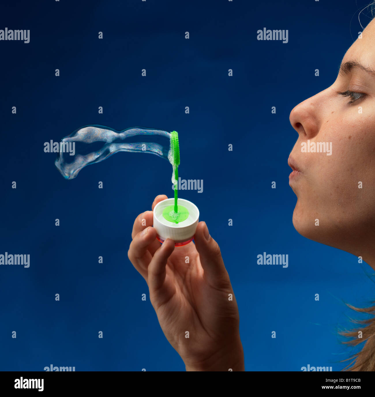 small bubble soap water fly made girl profile soft blue breathing out ...