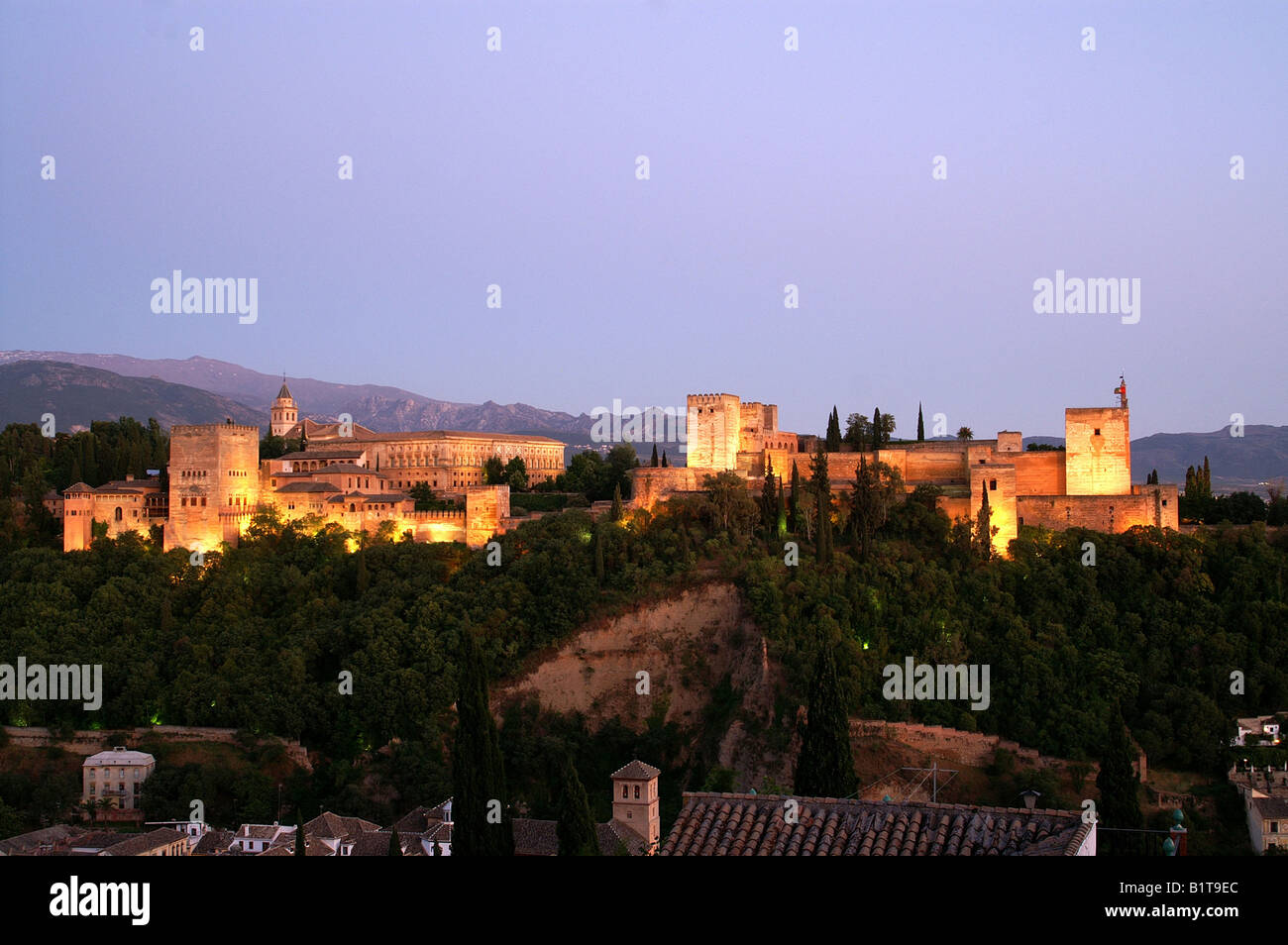 The Alhambra Granada with the Sierra Nevada in the distance at sunset ...