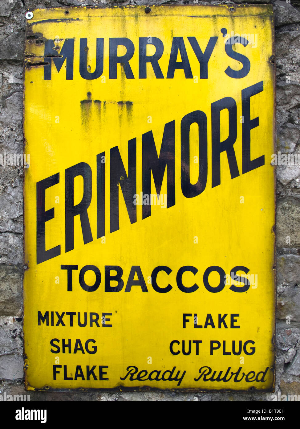 Traditional tin plate advertising sign Stock Photo - Alamy