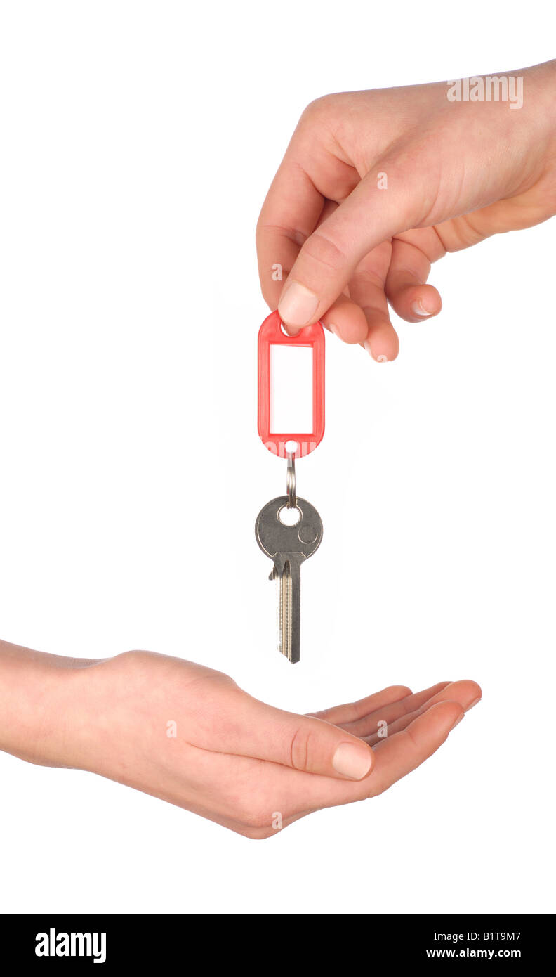 Hands with Key Stock Photo - Alamy