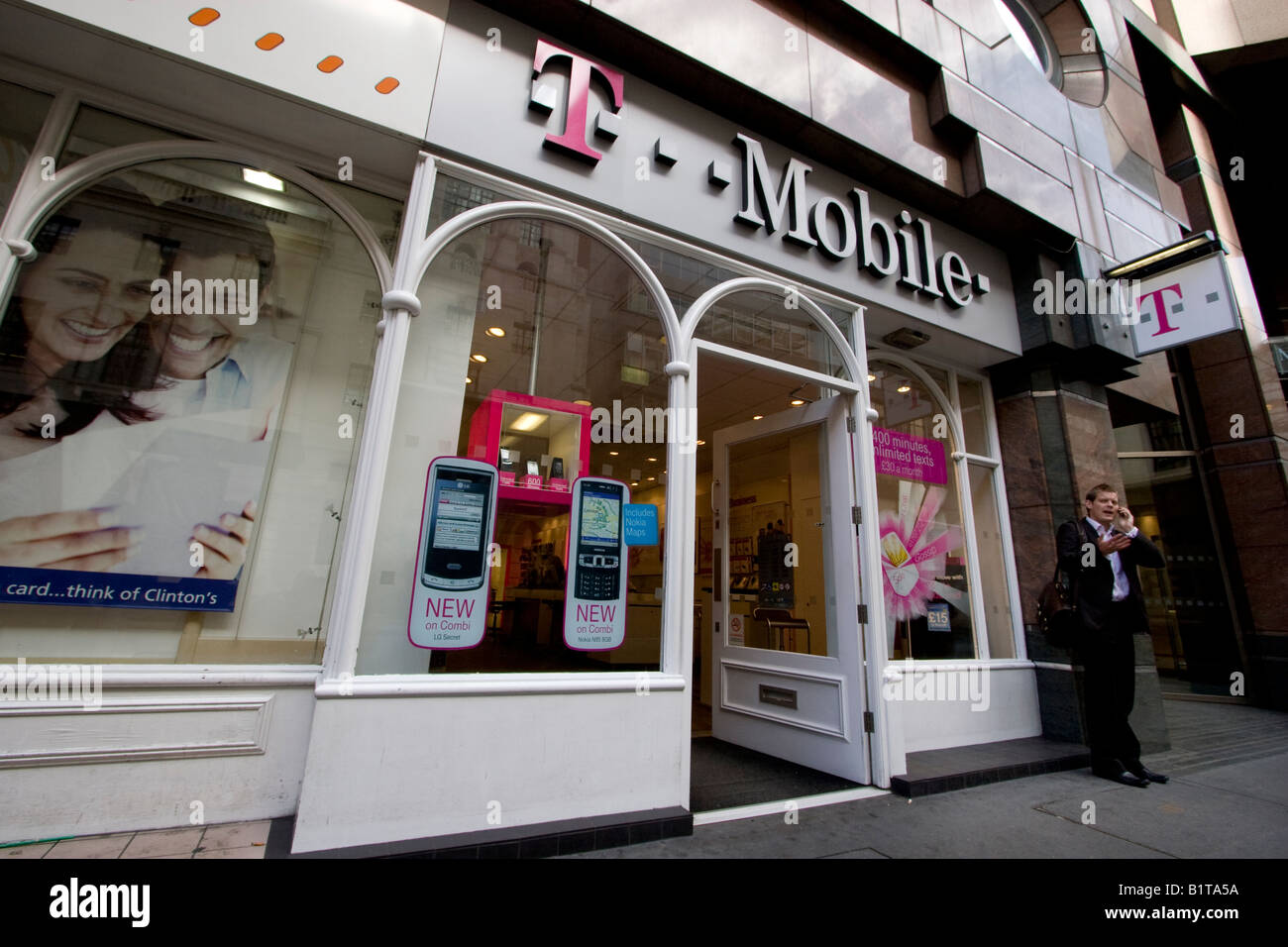 Tmobile T mobile phone retail outlet London UK with mobile phone user ...