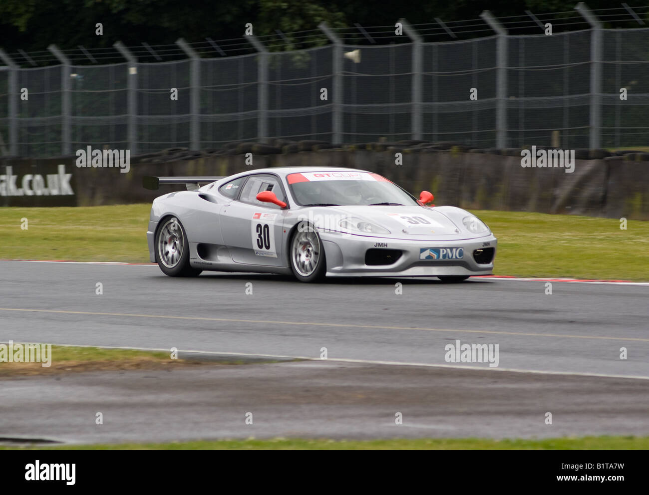 A Ferrari 360 GT Exiting Old Hall Corner in GT Cup at Oulton Park Motor ...