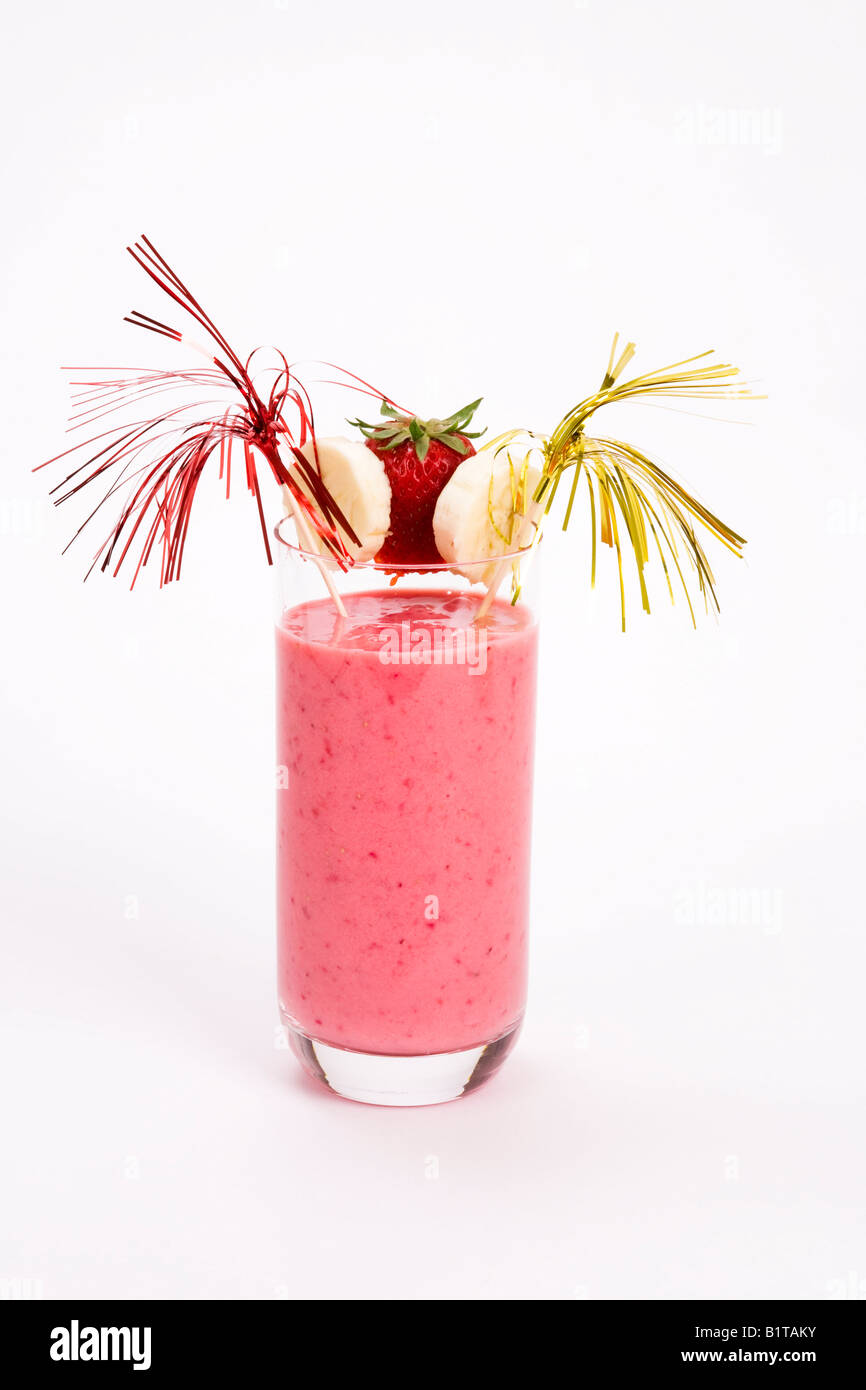 Glass of delicious strawberry milkshake - white background Stock Photo ...