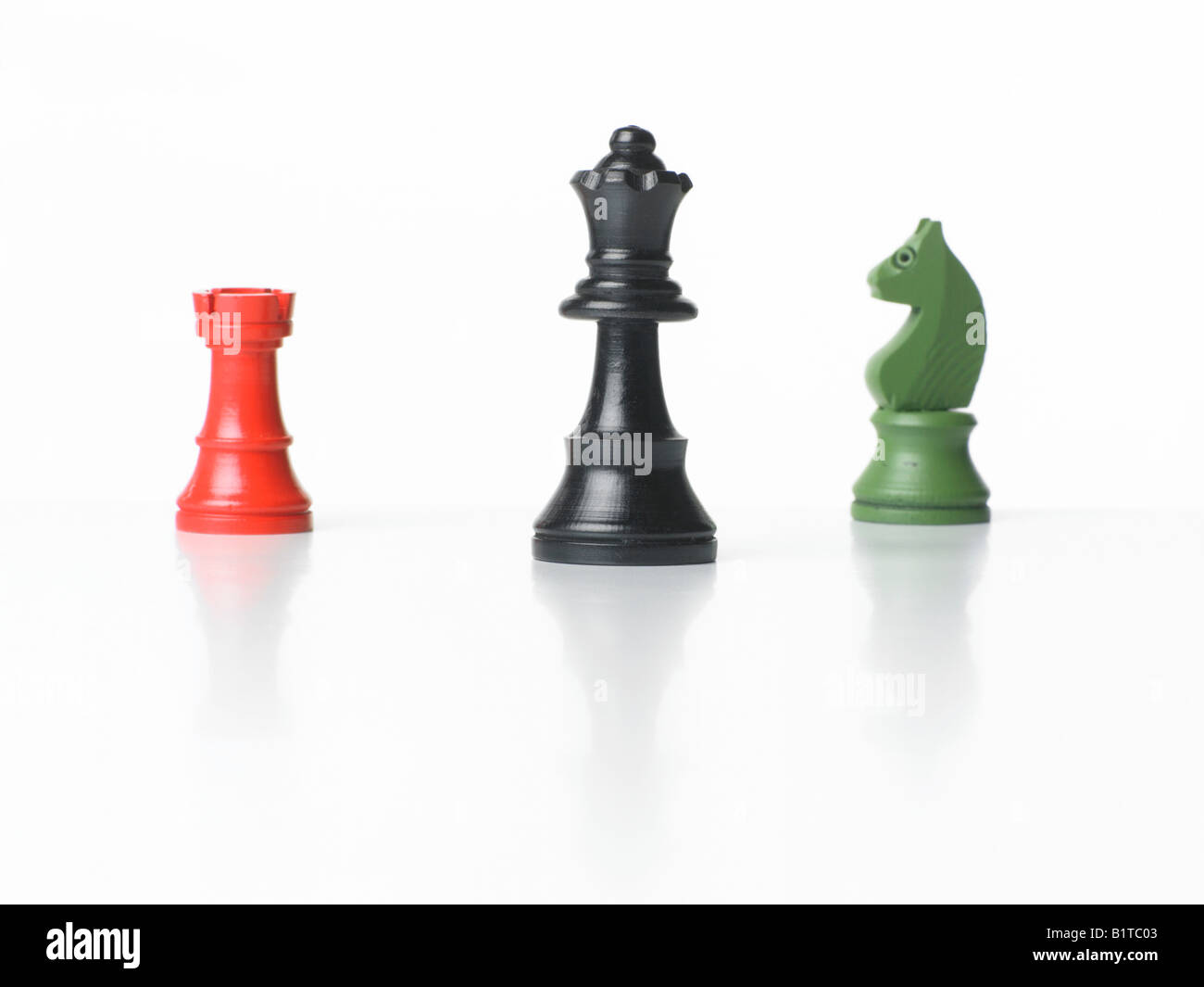 coloured chess pieces white background Stock Photo - Alamy
