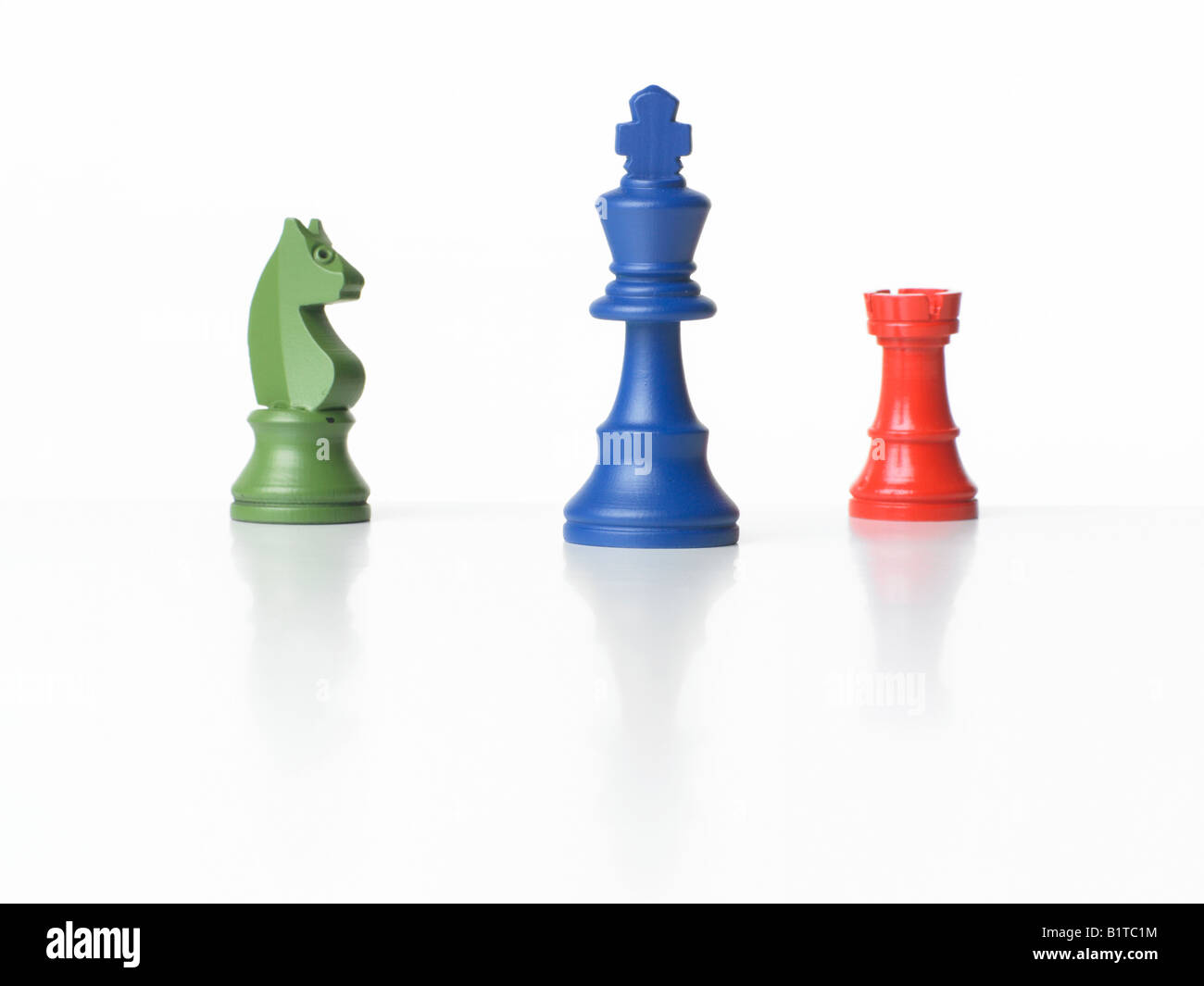 coloured chess pieces on white background with reflections Stock Photo ...