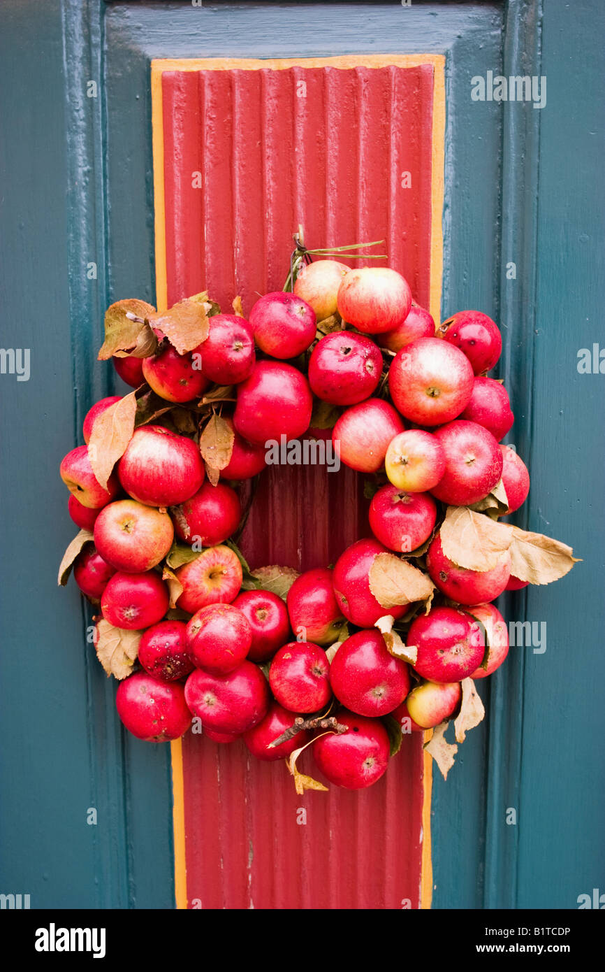 Apple wreath on the door Stock Photo - Alamy