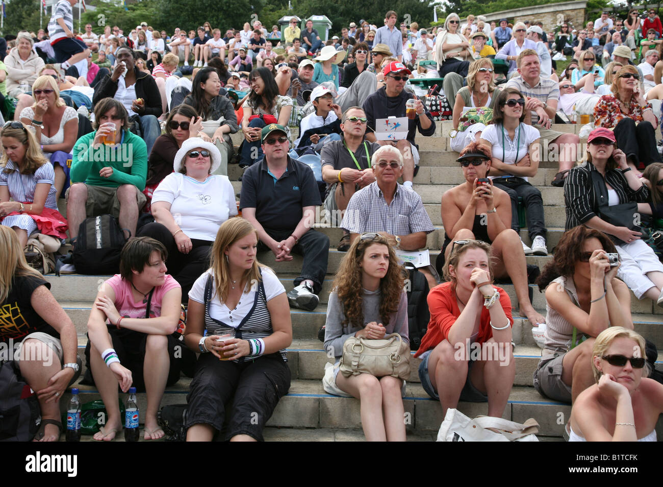 Wimbledon 2008 crowds of people sitting in Henman Hill watching a ...