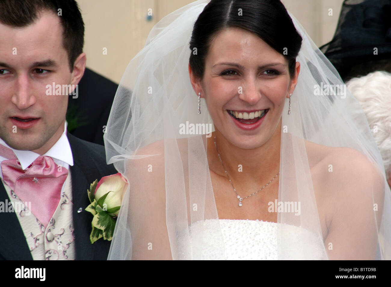 A happy smiling bride on her wedding day Stock Photo - Alamy