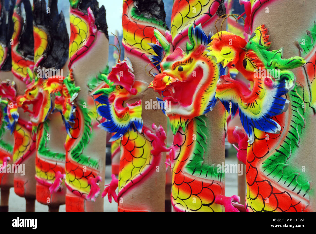 Giant incense sticks with dragon motif Stock Photo - Alamy